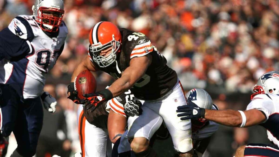 NFL legend Emmitt Smith visits a recovering Peyton Hillis after heroic effort landed him in the ...