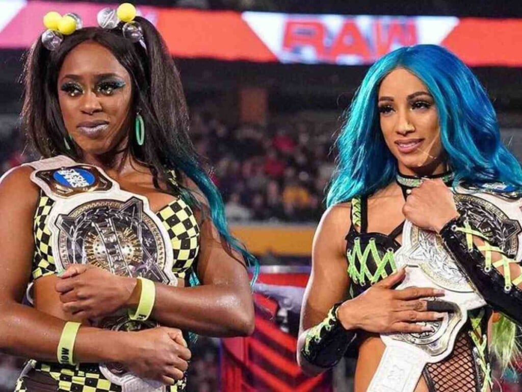 Who was going to be Naomi's partner for the tag team title run before ...