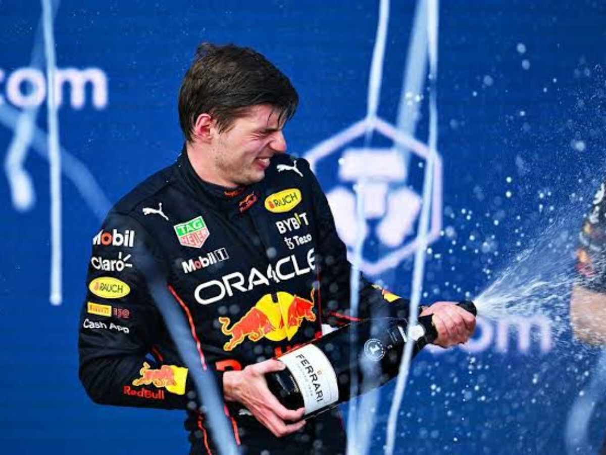 Why do Formula One drivers spray champagne after winning a race?