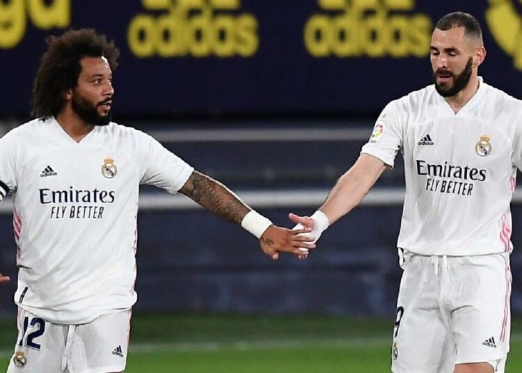 Karim Benzema slides past Marcelo to become the most decorated player ...