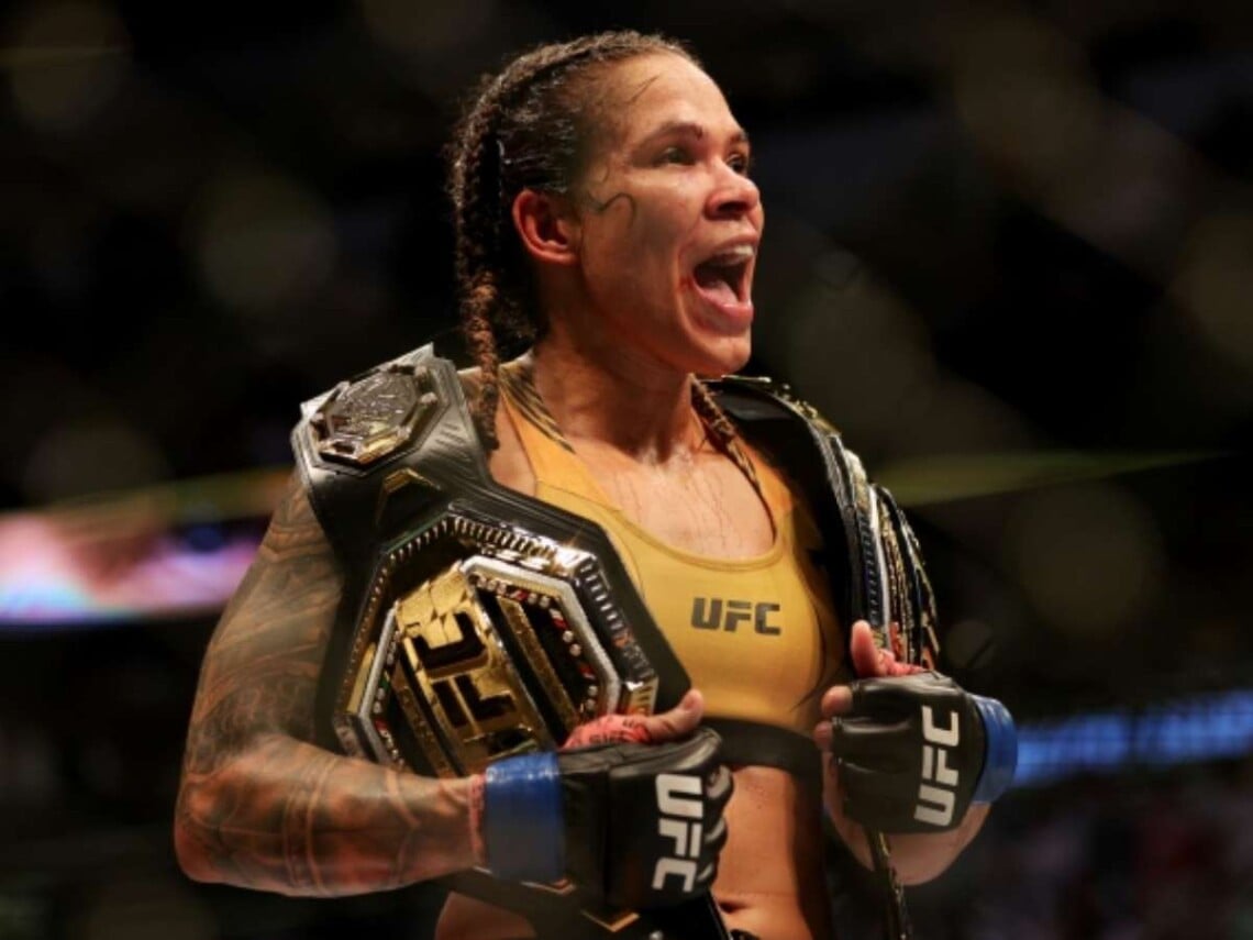 Why is Amanda Nunes considered the greatest female UFC fighter?