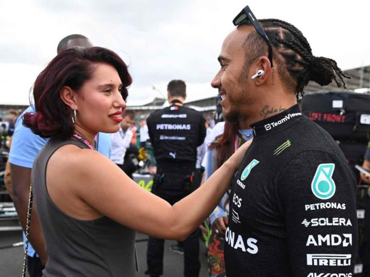 Lewis Hamilton charms 'Escapism' singer Raye as she looks lost in love ...